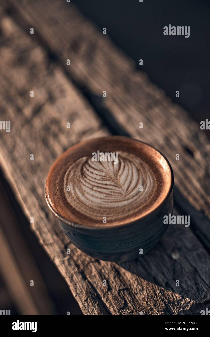 Selective focus cup of hot latte art coffee,focus at white foam Stock ...