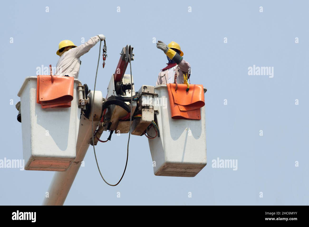 Worker climbing utility pole hi-res stock photography and images - Alamy