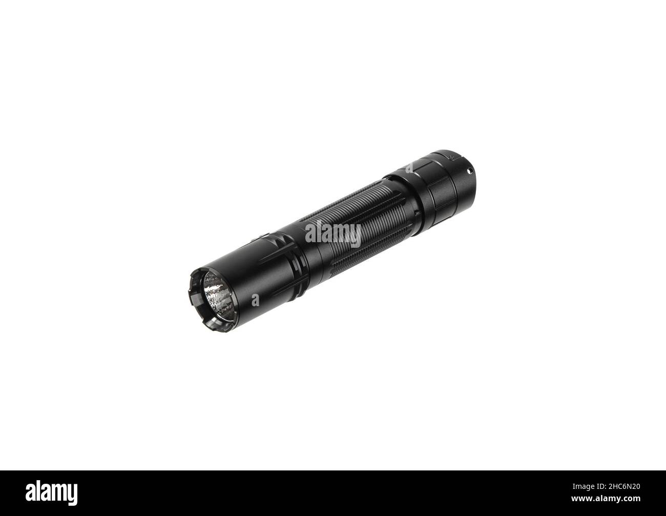 Modern metal LED flashlight. Portable lighting device. Isolate on a ...