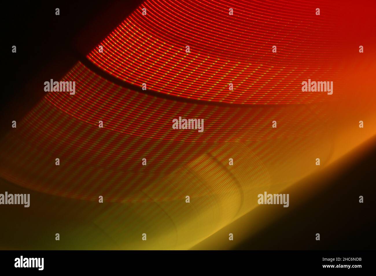 A red digital tech background design with abstract illuminated lines ...