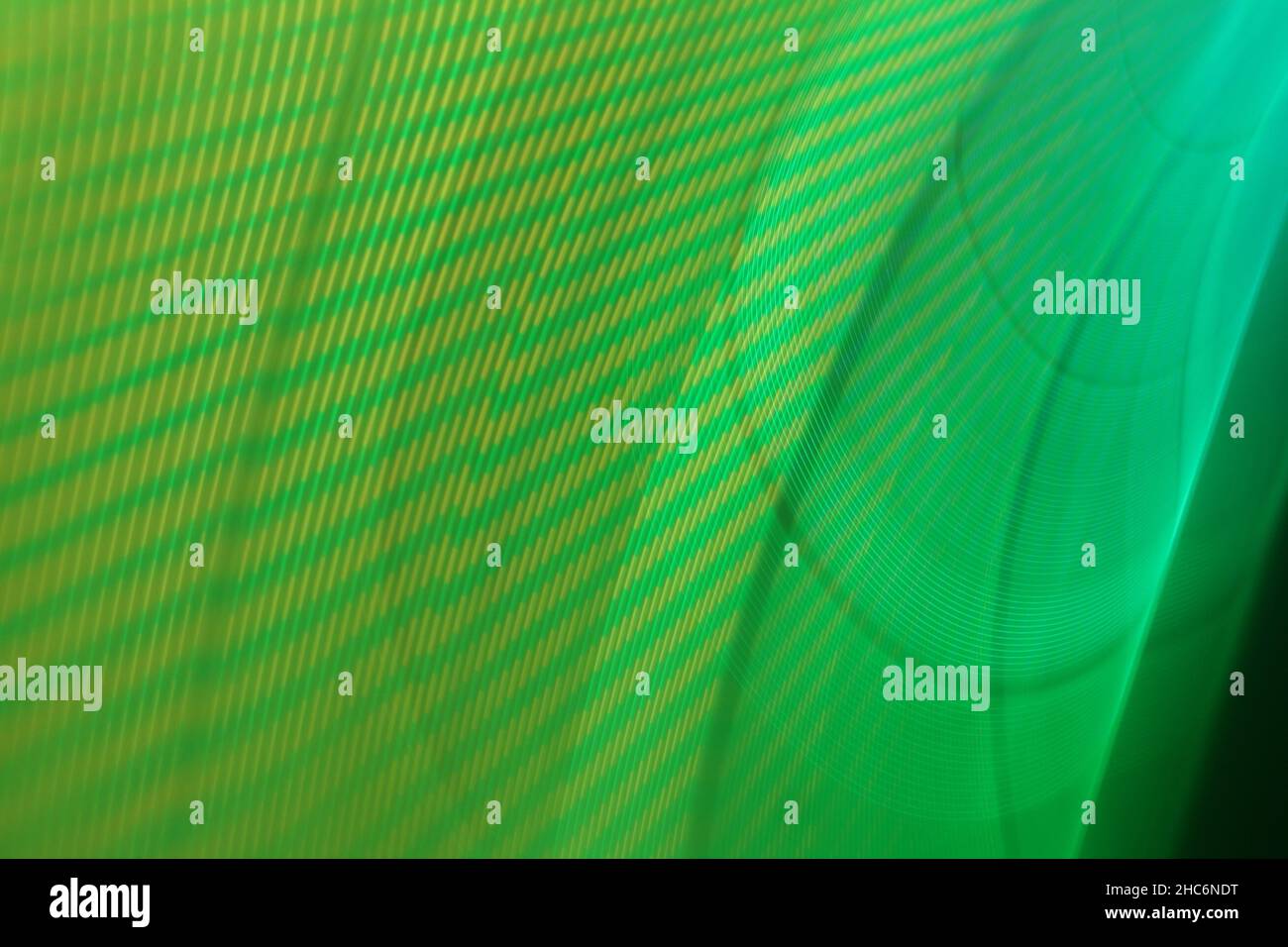 A green digital tech background design with abstract illuminated lines ...