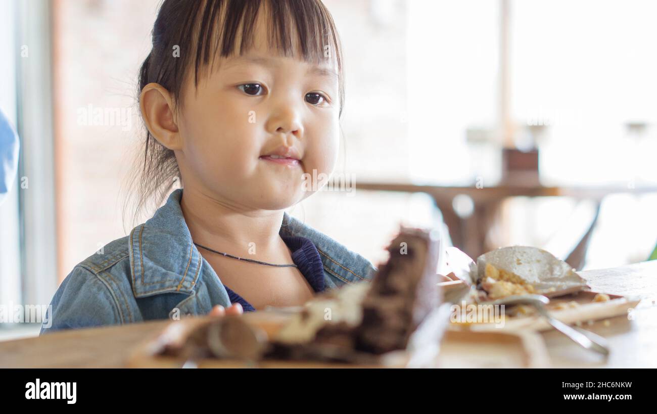 Girl face after eating chocolate hi-res stock photography and images ...