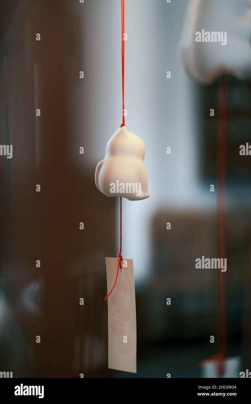 A doll hanging from a rope Stock Photo - Alamy