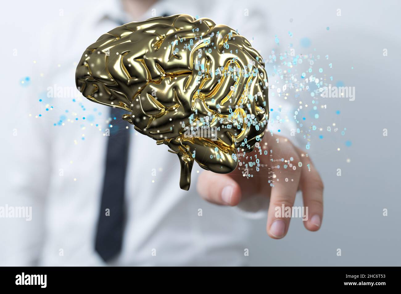 Male's hand pointing to an illustration of a golden brain Stock Photo ...