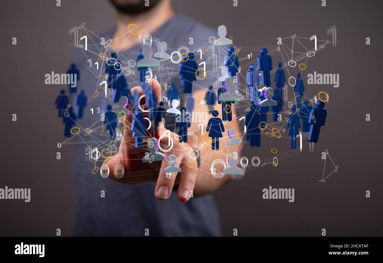 Male's hand holding an illustration of a group of people - network ...