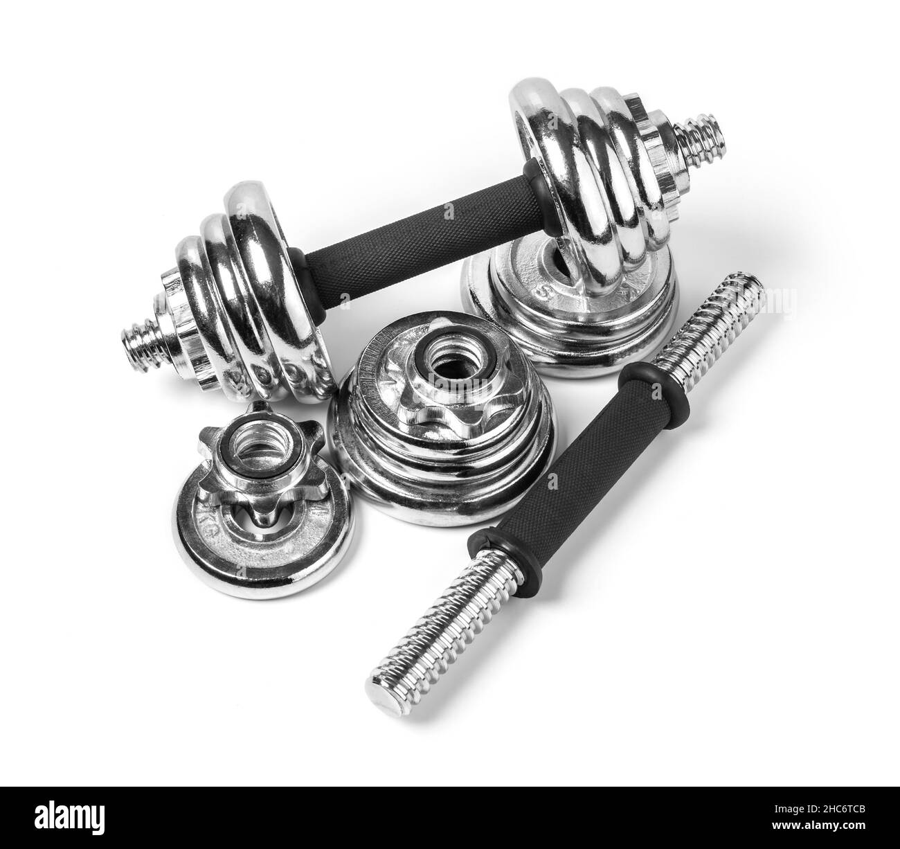 metal dumbbells set over white background Stock Photo - Alamy