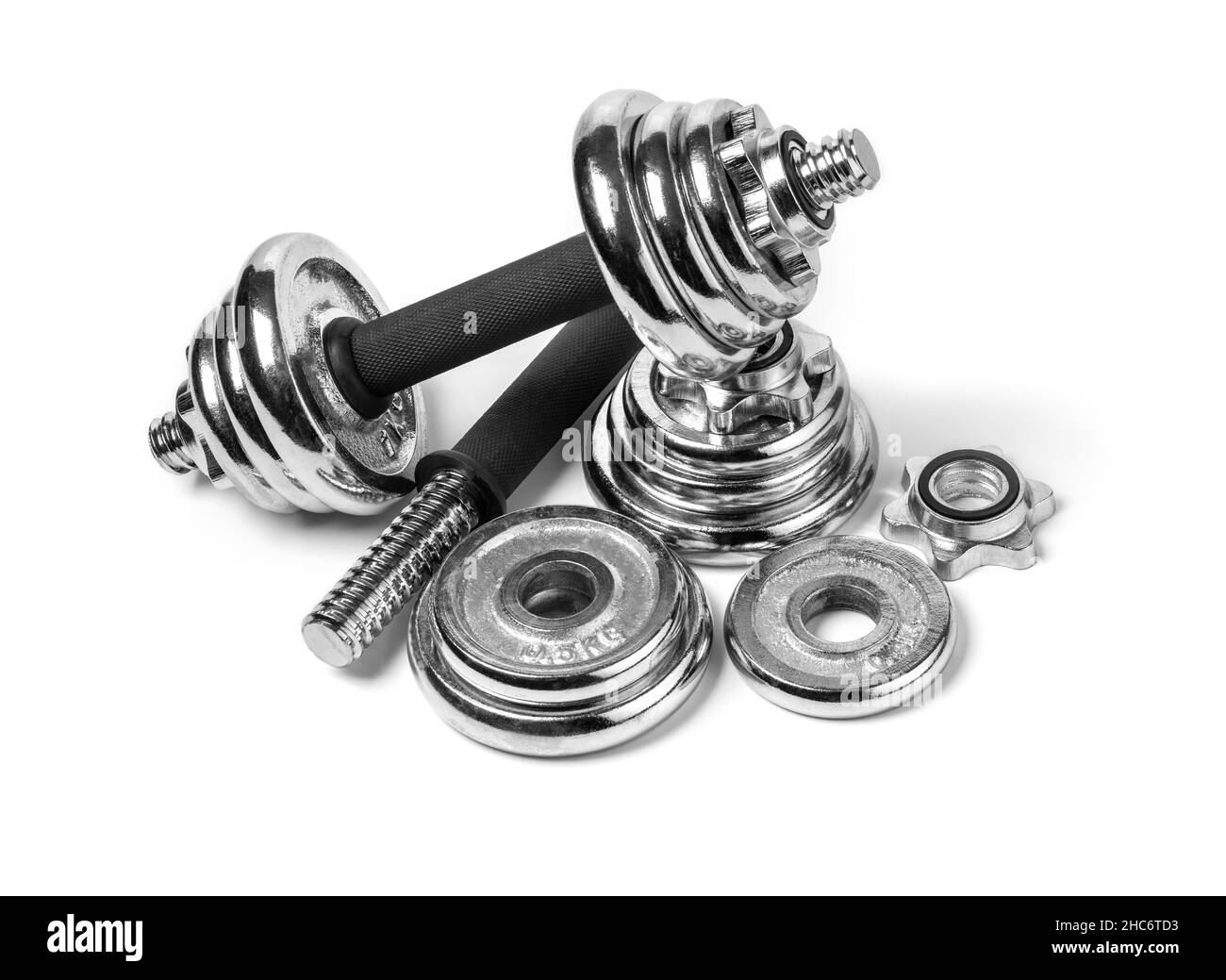 metal dumbbells set over white background Stock Photo - Alamy