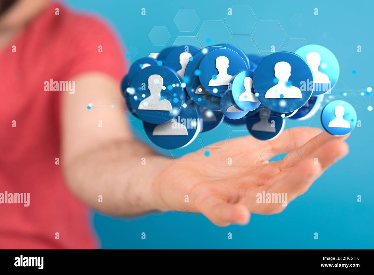 Female's hand holding an illustration of a group project Stock Photo ...