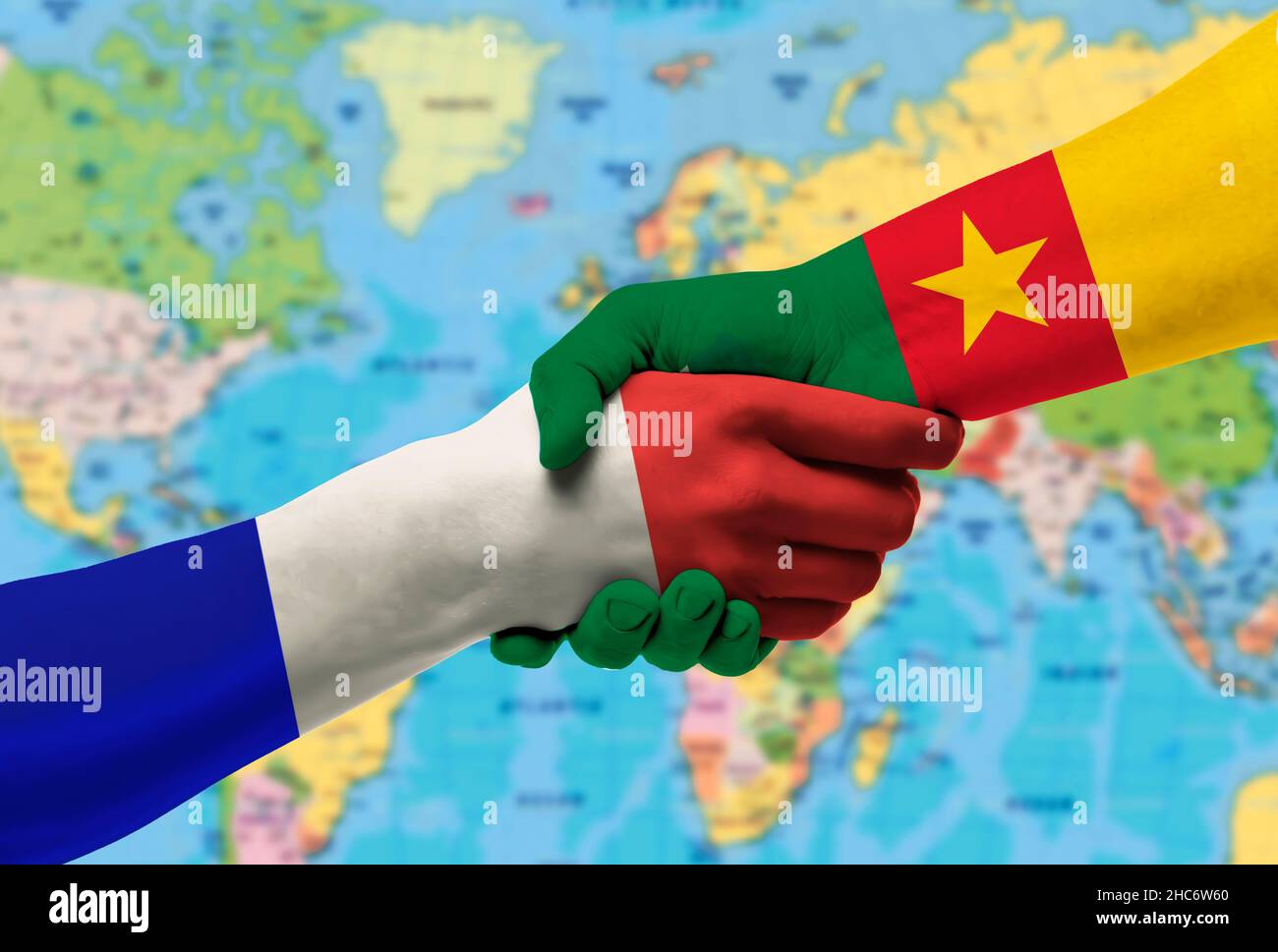Flags France and Cameroon countries, handshake cooperation, partnership ...