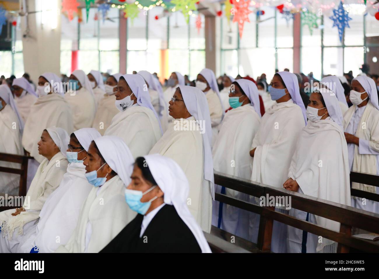 Bangladeshi Christian People offering prayer in Church during Christmas ...