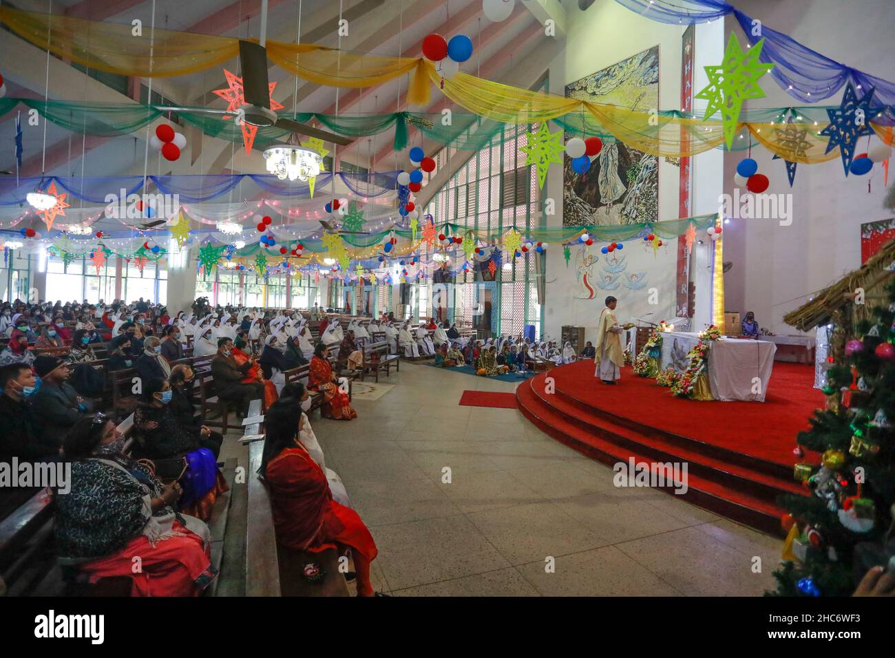 Bangladeshi Christian People offering prayer in Church during Christmas ...