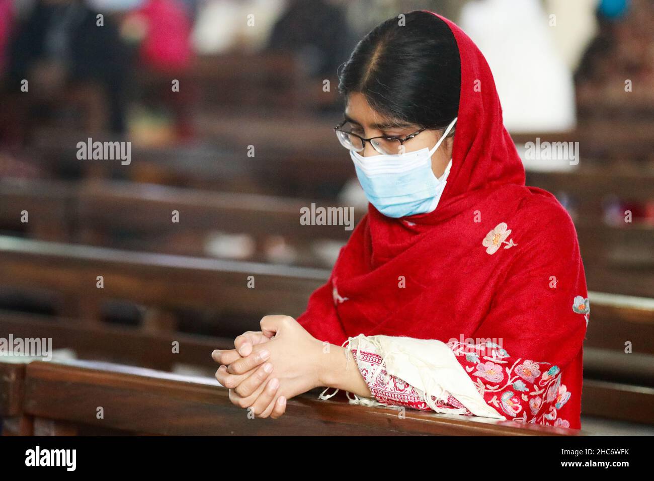 Bangladeshi Christian People offering prayer in Church during Christmas ...