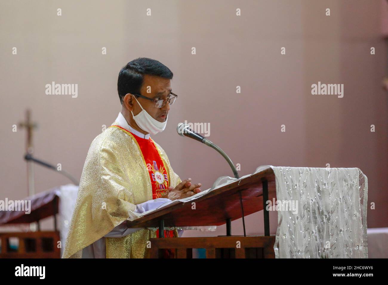 Bangladeshi Christian People offering prayer in Church during Christmas ...