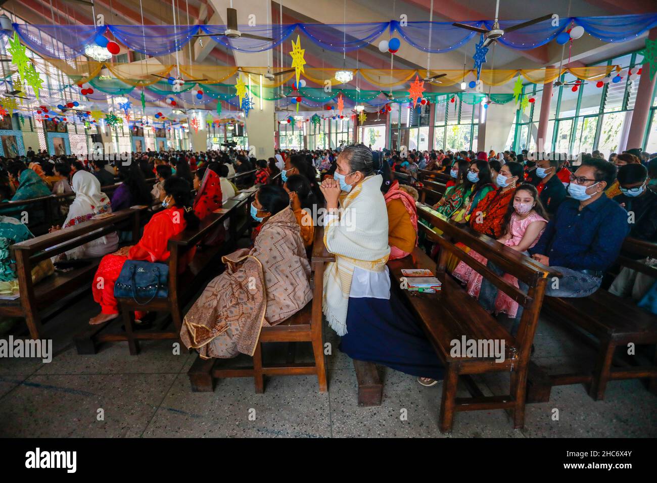 Bangladeshi Christian People offering prayer in Church during Christmas ...