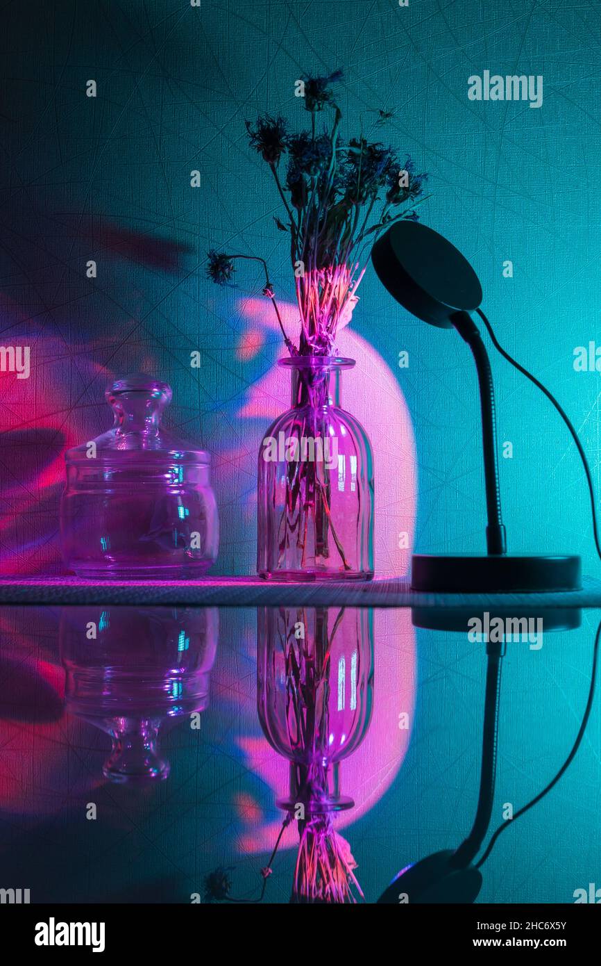 Sunset LED RGB lighting decor. Shadow on surface illuminated by ...