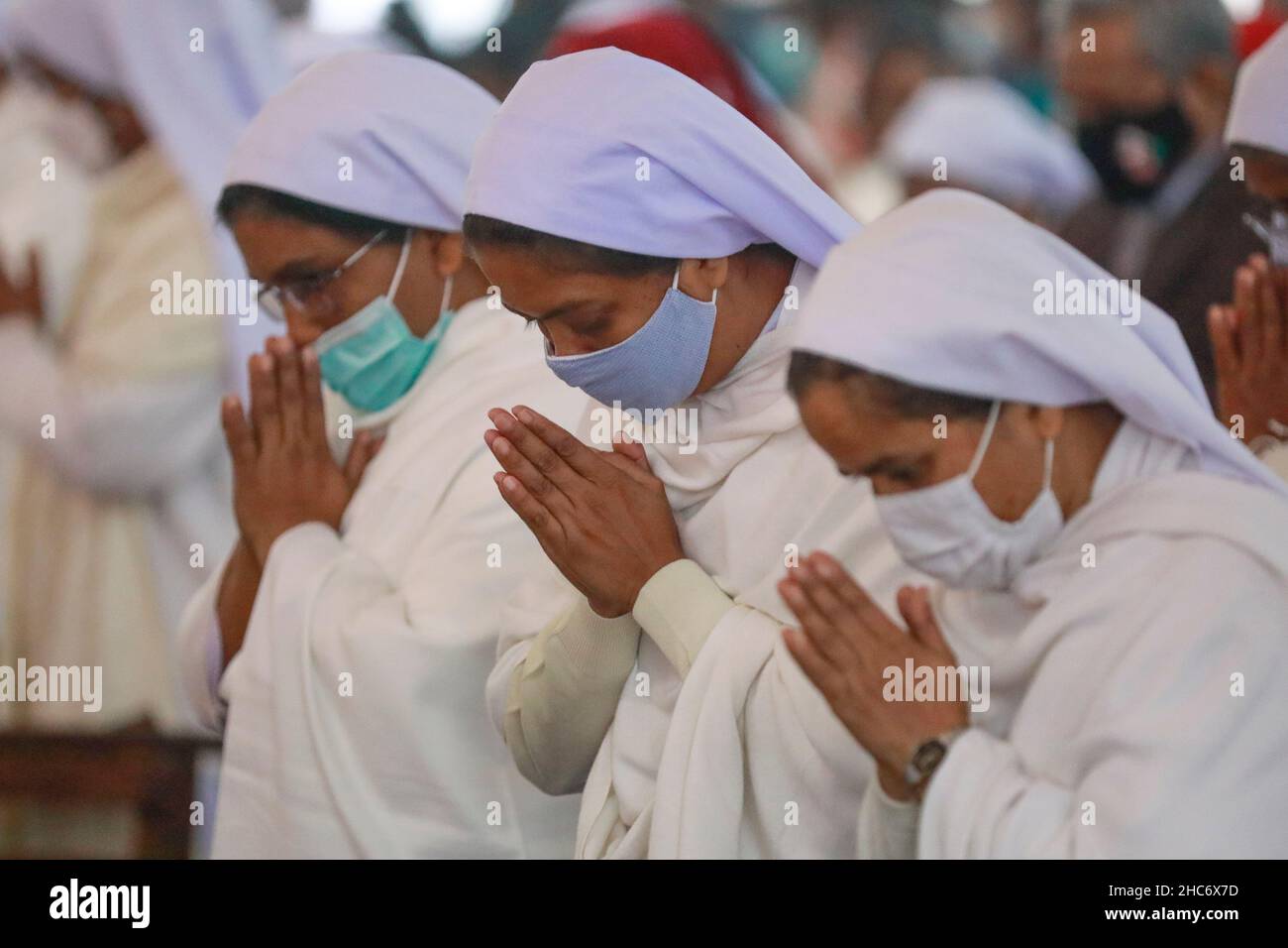 Bangladeshi Christian People offering prayer in Church during Christmas ...
