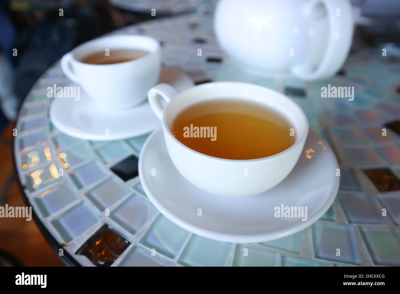 hot tea , tea cup and kettle for serve Stock Photo - Alamy
