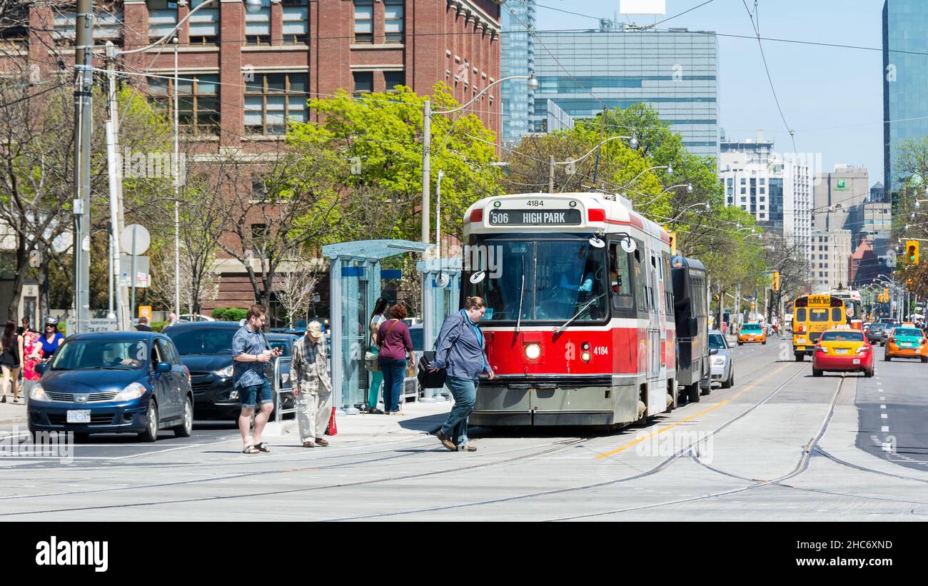 People and city life in a streetcar stop in Toronto, Canada Stock Photo ...