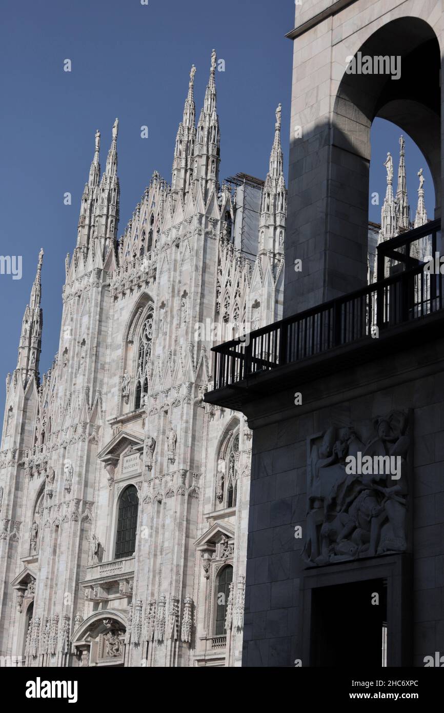 Vertical low angle view of the Milan Cathedral under the sun in Milan ...