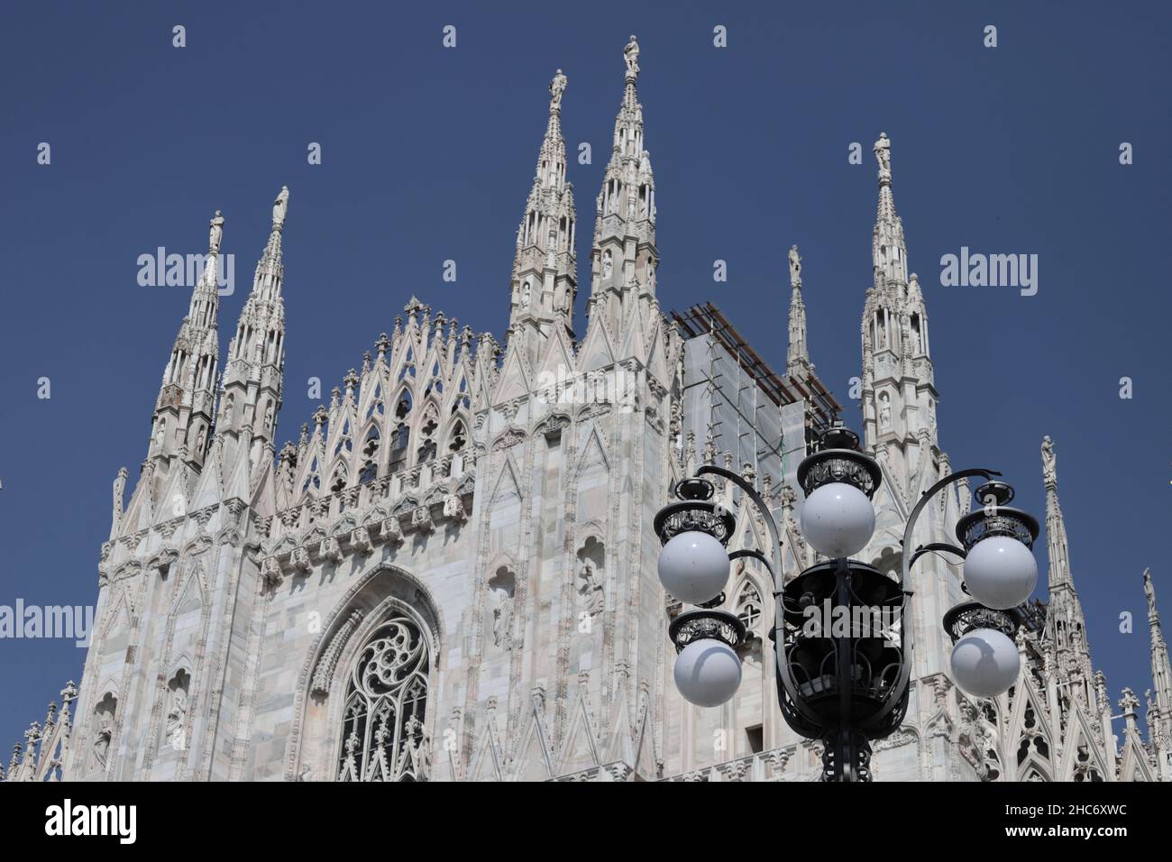 Low angle view of the Milan Cathedral under the clear blue sky Stock ...