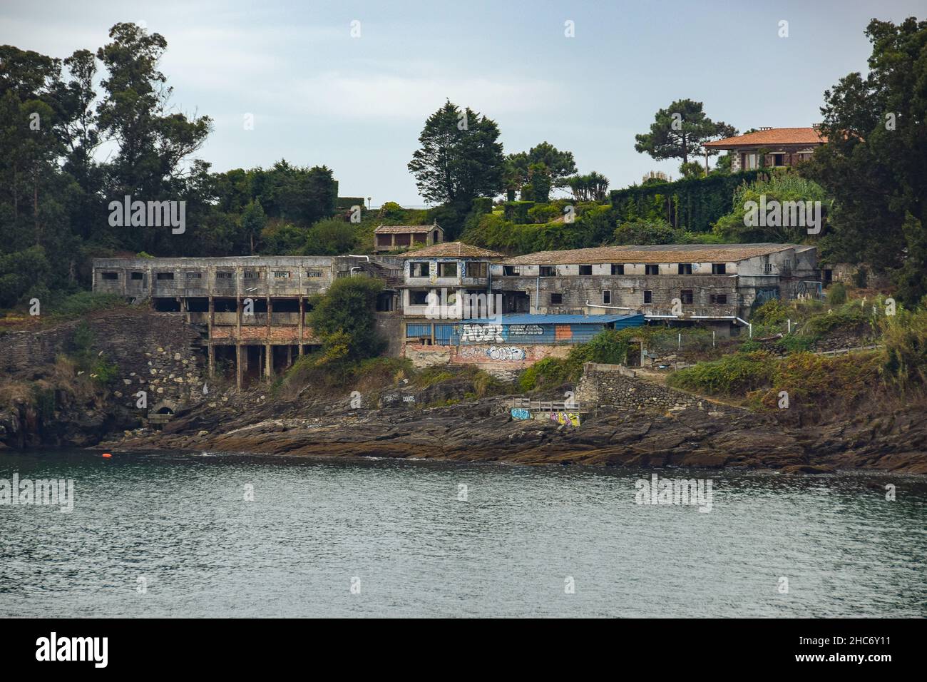 Old ruined sea shore buildings in Galicia, Spain at daytime Stock Photo ...