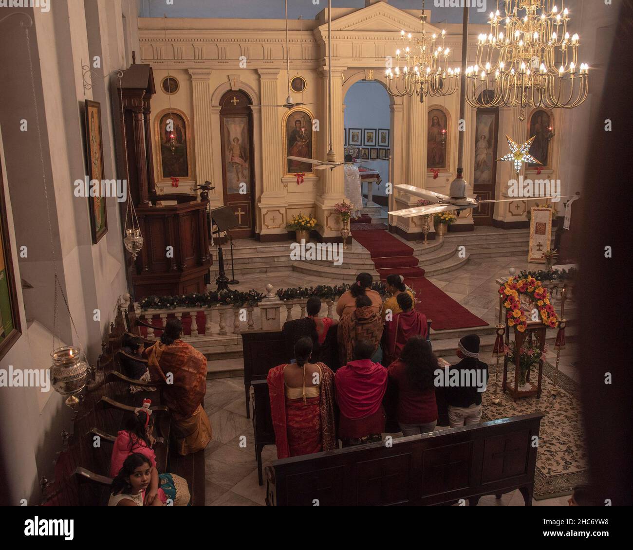 Kolkata, India. 24th Dec, 2021. Different moments of mass prayer on ...