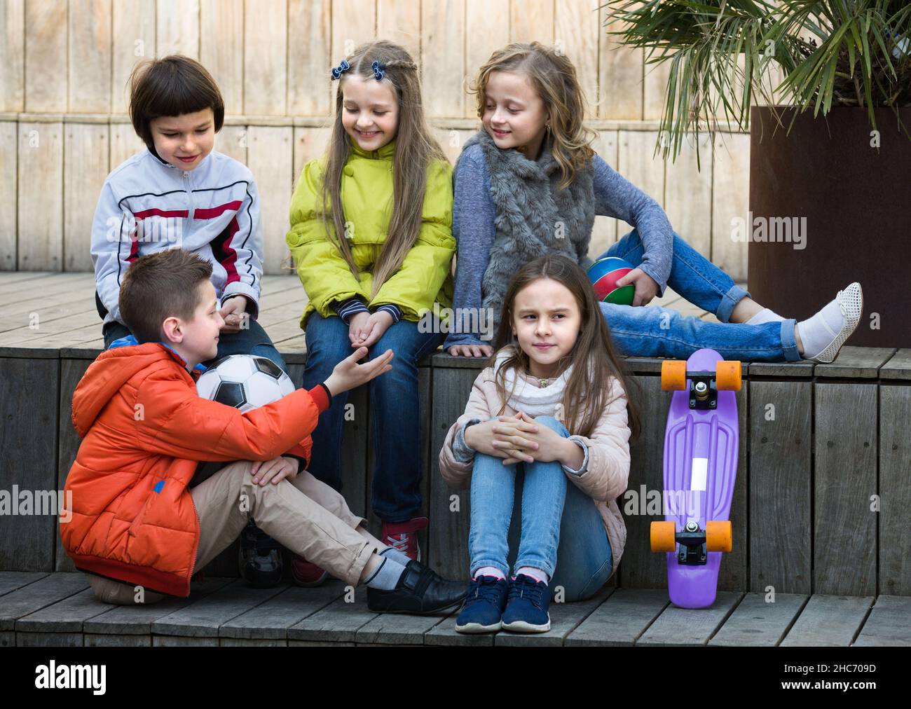 children chatting outdoors Stock Photo - Alamy