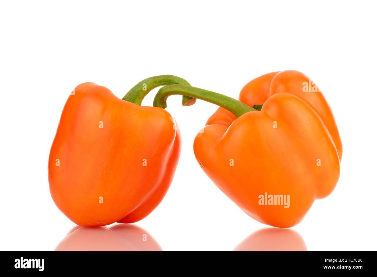 Two ripe orange sweet peppers, close-up, isolated on white Stock Photo ...