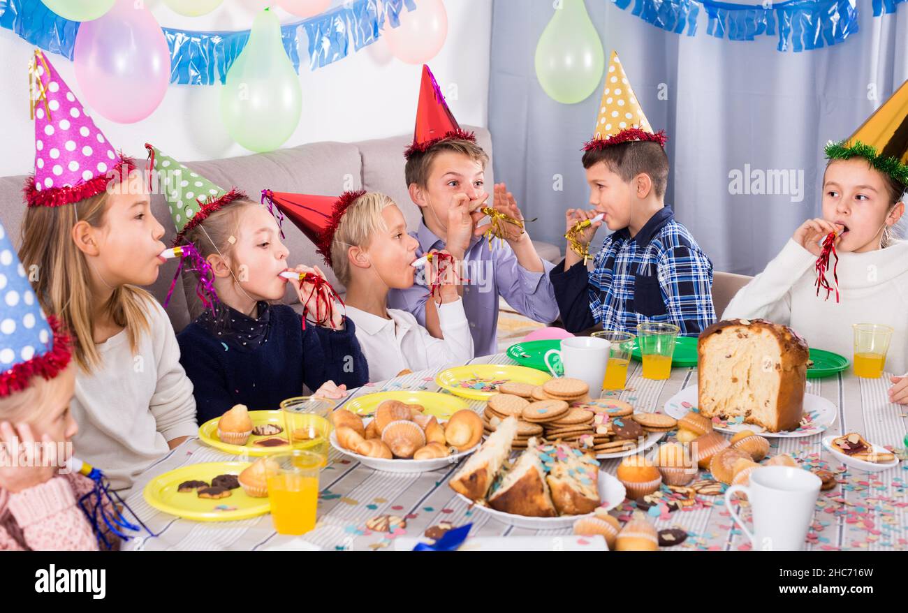 positive children having a good time at a birthday party Stock Photo ...