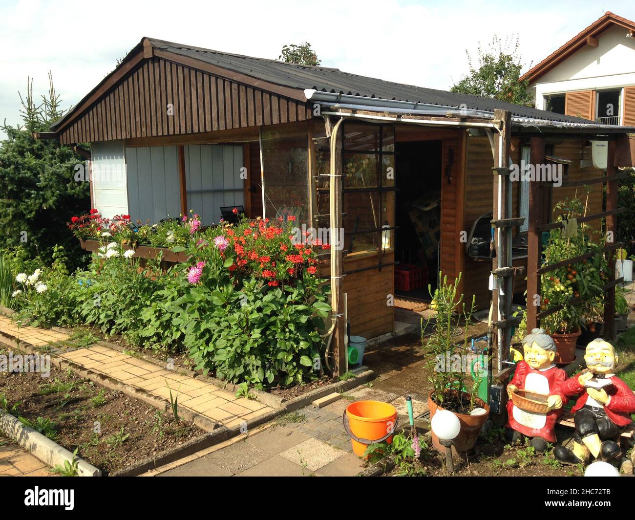 Beautiful garden house in the daytime Stock Photo - Alamy