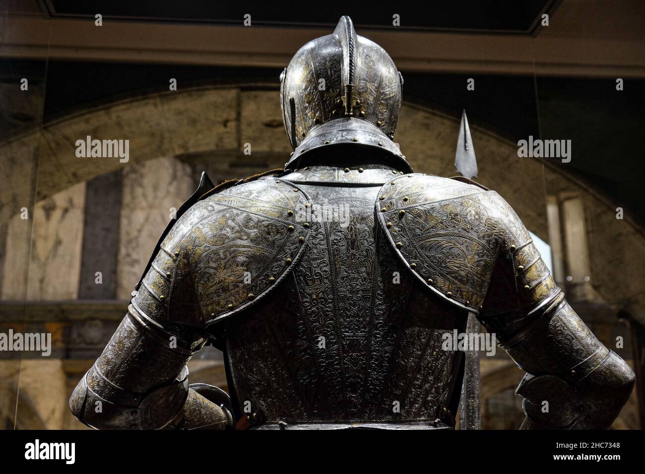 Low angle closeup of a metal ancient suit of armor in the Napoli Museum ...