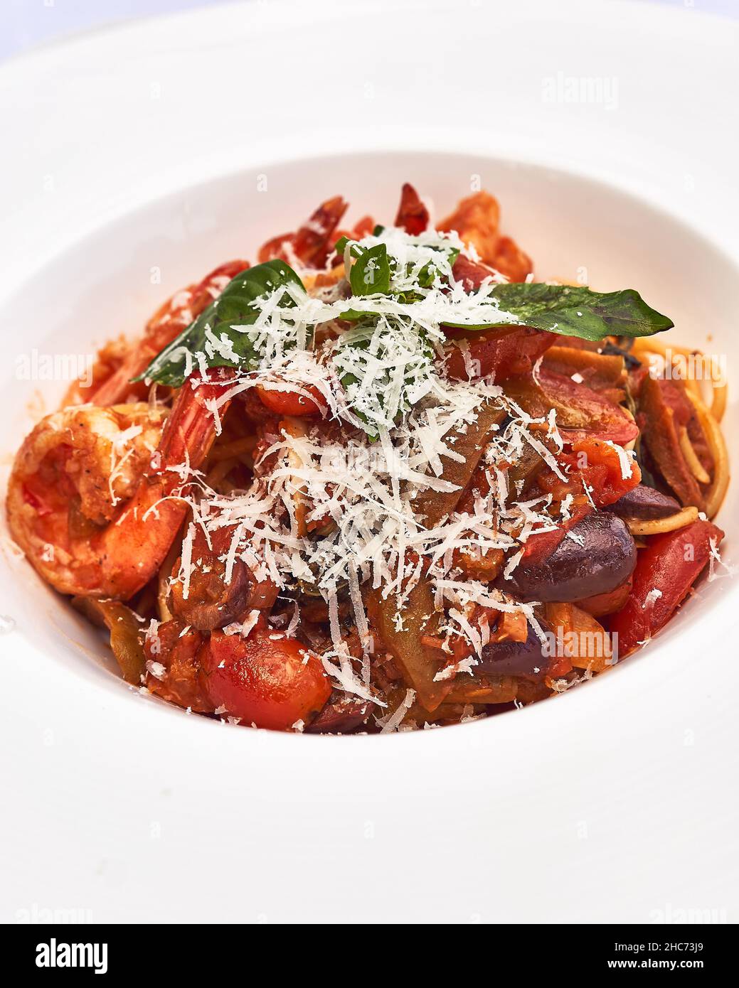 Vertical shot of pasta with tomato sauce and parmesan Stock Photo - Alamy