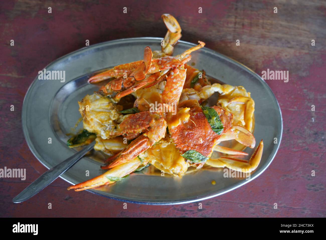 Traditional Indonesian dish with seafood Stock Photo - Alamy