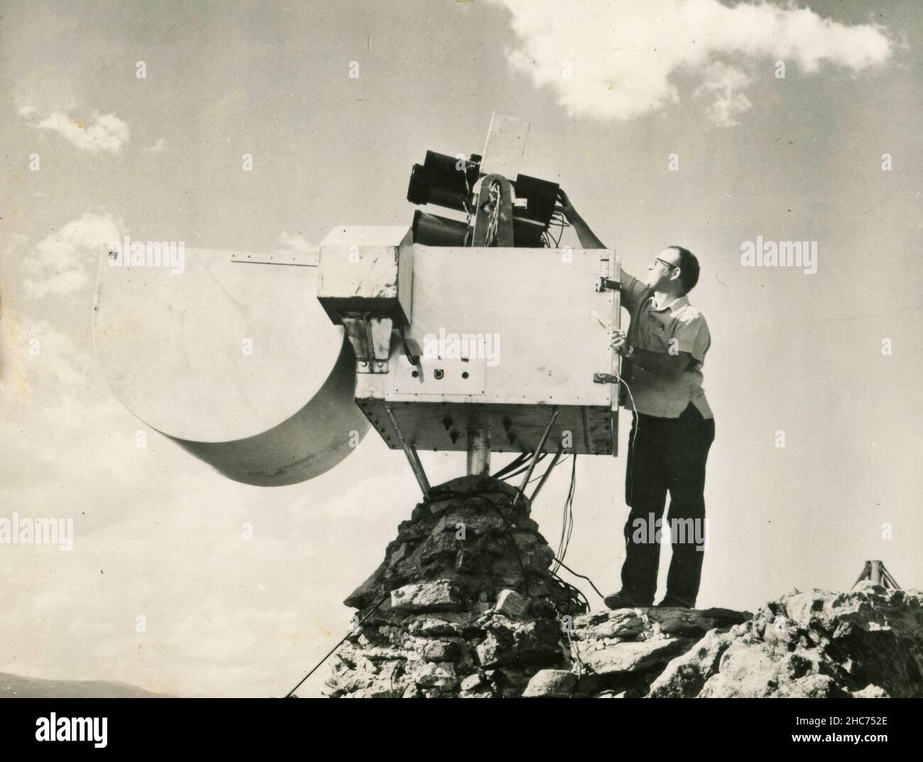 Scientist doing tests outside at the machine, USA 1950s Stock Photo - Alamy