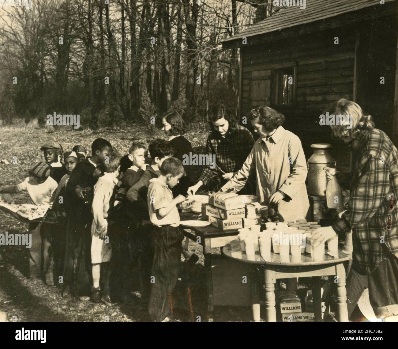 Mothers serving breakfast to Children at an Outdoor Picnic, USA 1940s ...