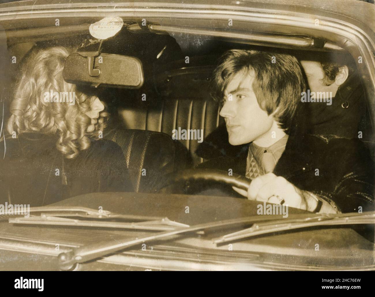 British singer Mal Ryder in the car with a woman, Italy 1970 Stock ...