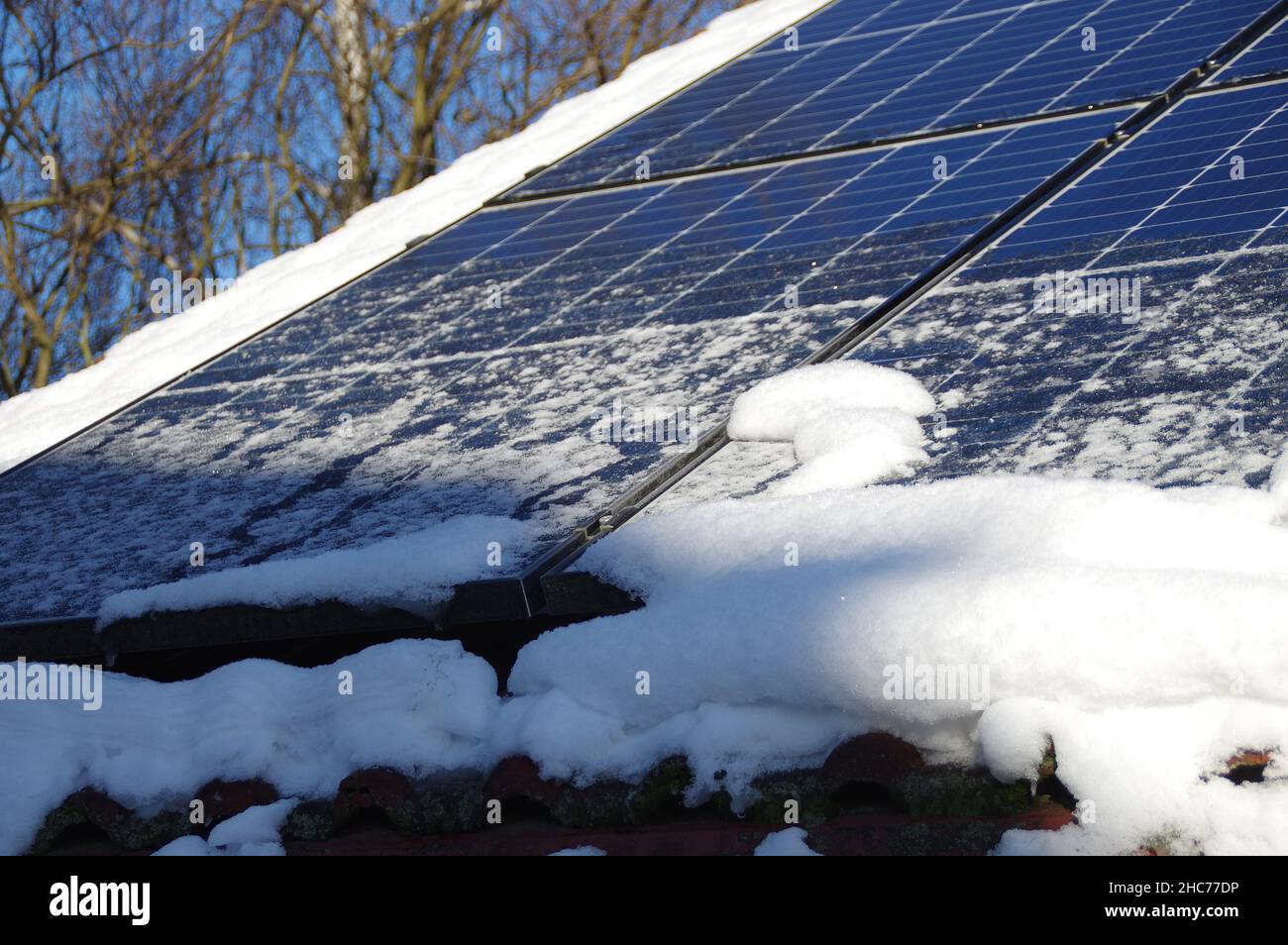 Solar panels covered with snow hi-res stock photography and images - Alamy