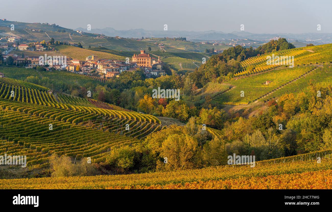 Beautiful hills and vineyards during fall season surrounding Barolo ...