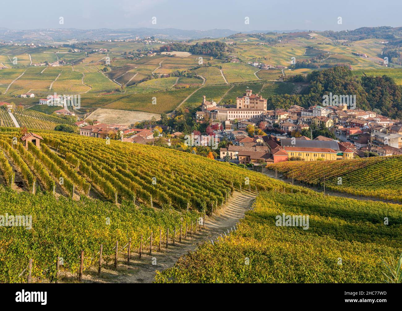 Beautiful hills and vineyards during fall season surrounding Barolo ...