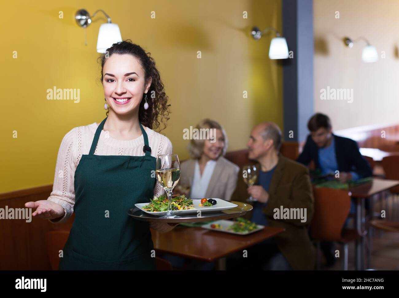 Waitress bringing wine table hi-res stock photography and images - Alamy