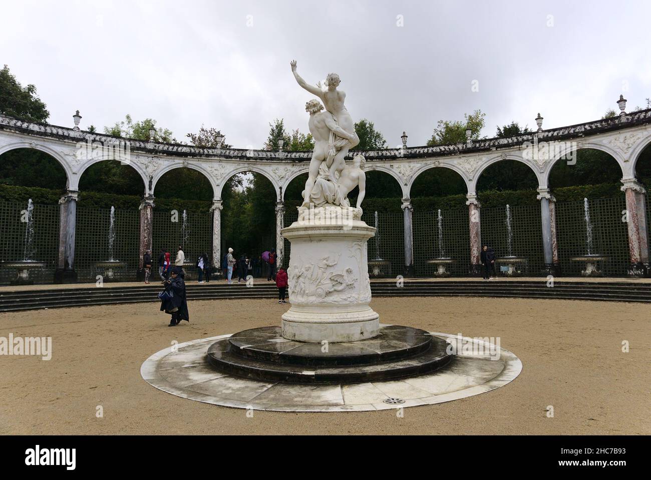 Colonnade grove at Versailles palace against a cloudy sky in Paris ...