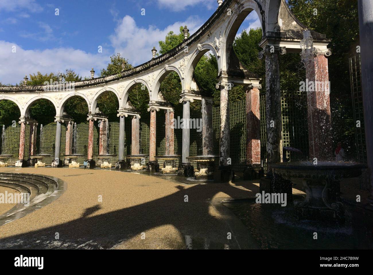 Colonnade grove at Versailles palace on a sunny day in Paris, France ...