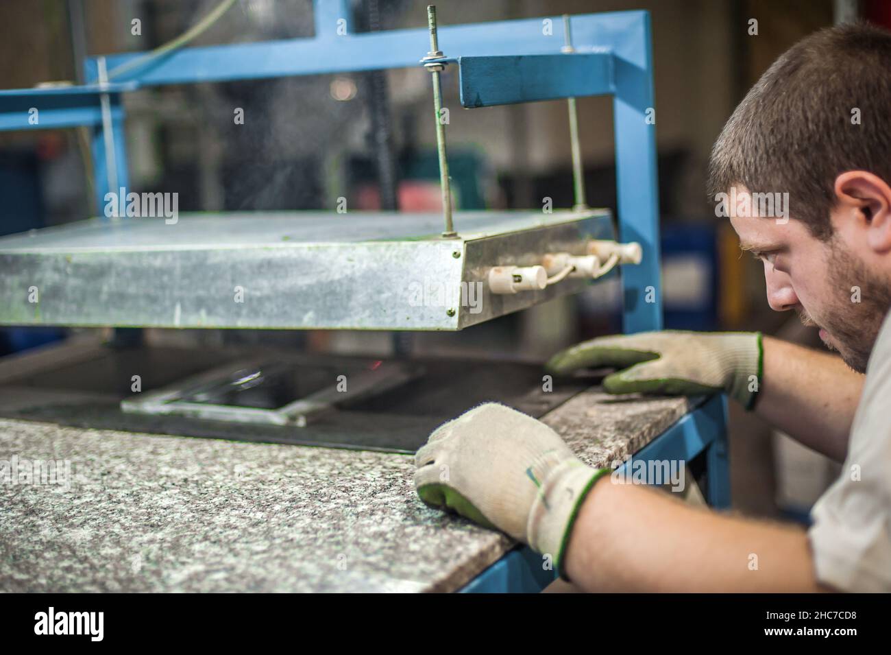 Professional worker machinist engineer technician operating with ...