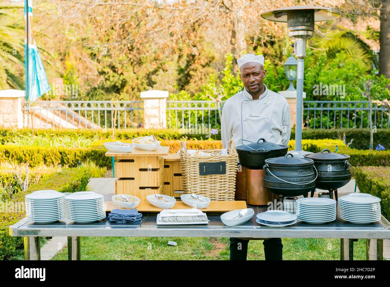 Johannesburg, South Africa - August 15, 2018: Catering staff at outdoor ...