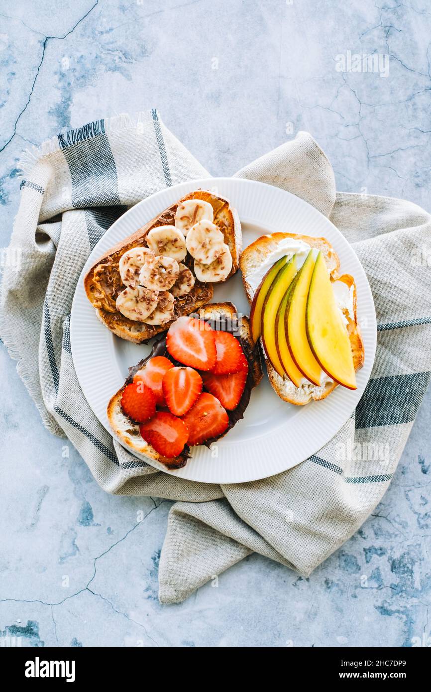 Delicious fruit toasts mix for breakfast, lunch or snack. Healthy food ...