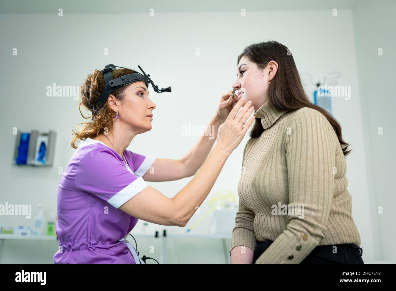 Doctor examine nose woman hi-res stock photography and images - Alamy