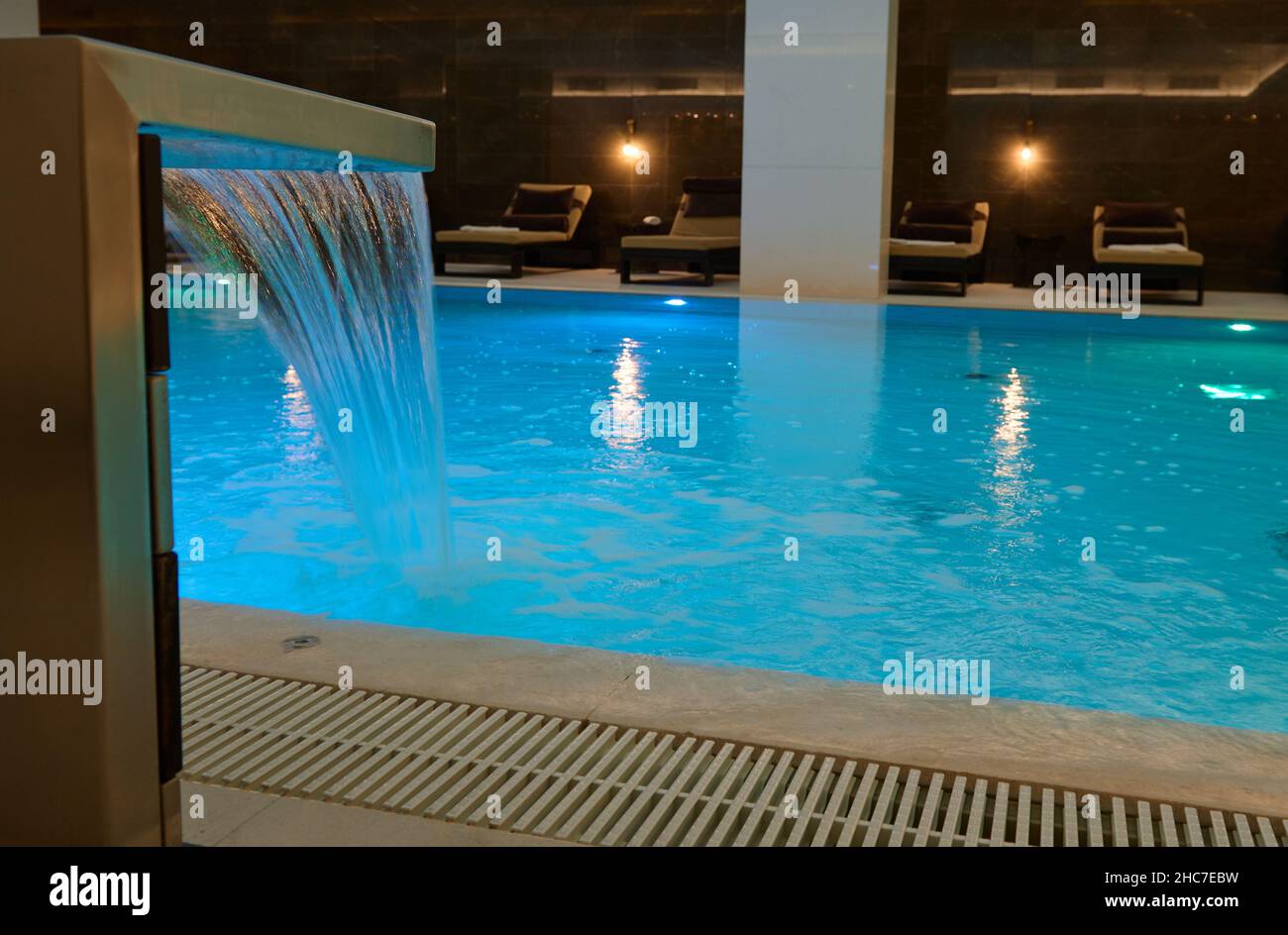 View of a beautiful interior with indoor thermal swimming pool with ...
