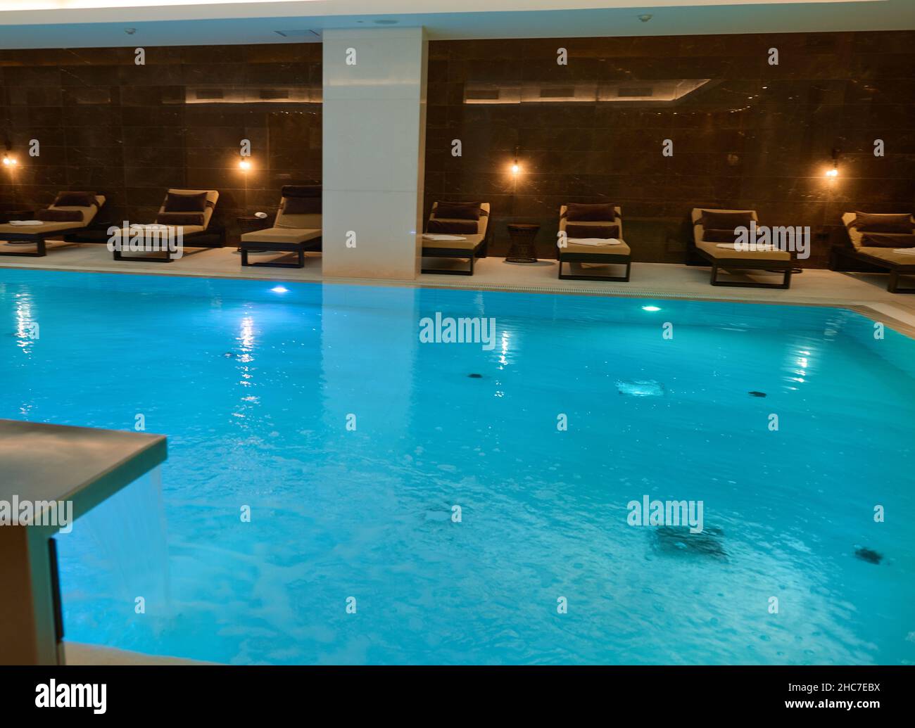 View of a beautiful spacious interior with indoor thermal swimming pool ...