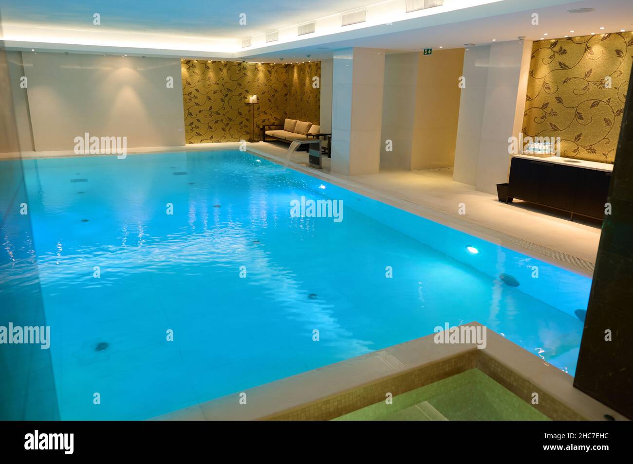View of a beautiful spacious interior with indoor thermal swimming pool ...