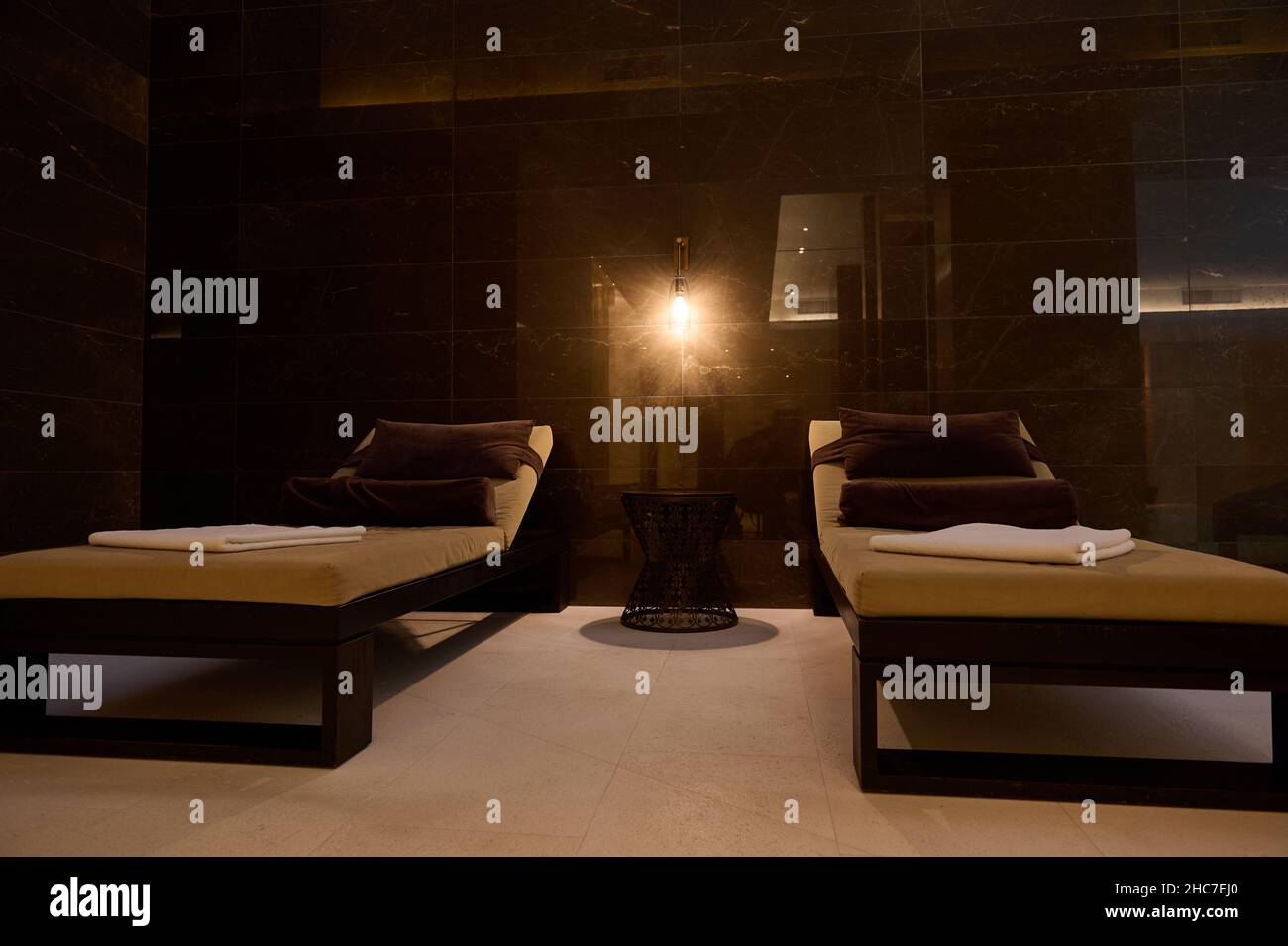 Modern spa center interior. Close-up of loungers in spa room at wellness spa complex Stock Photo ...